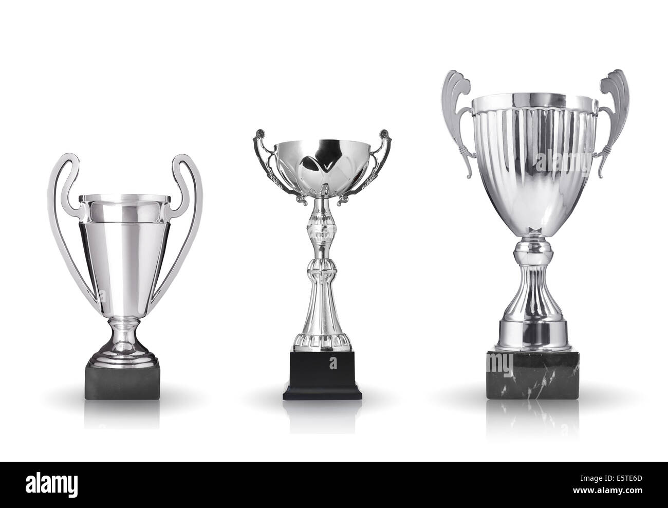 three different kind of silver trophies. Isolated on white background ...