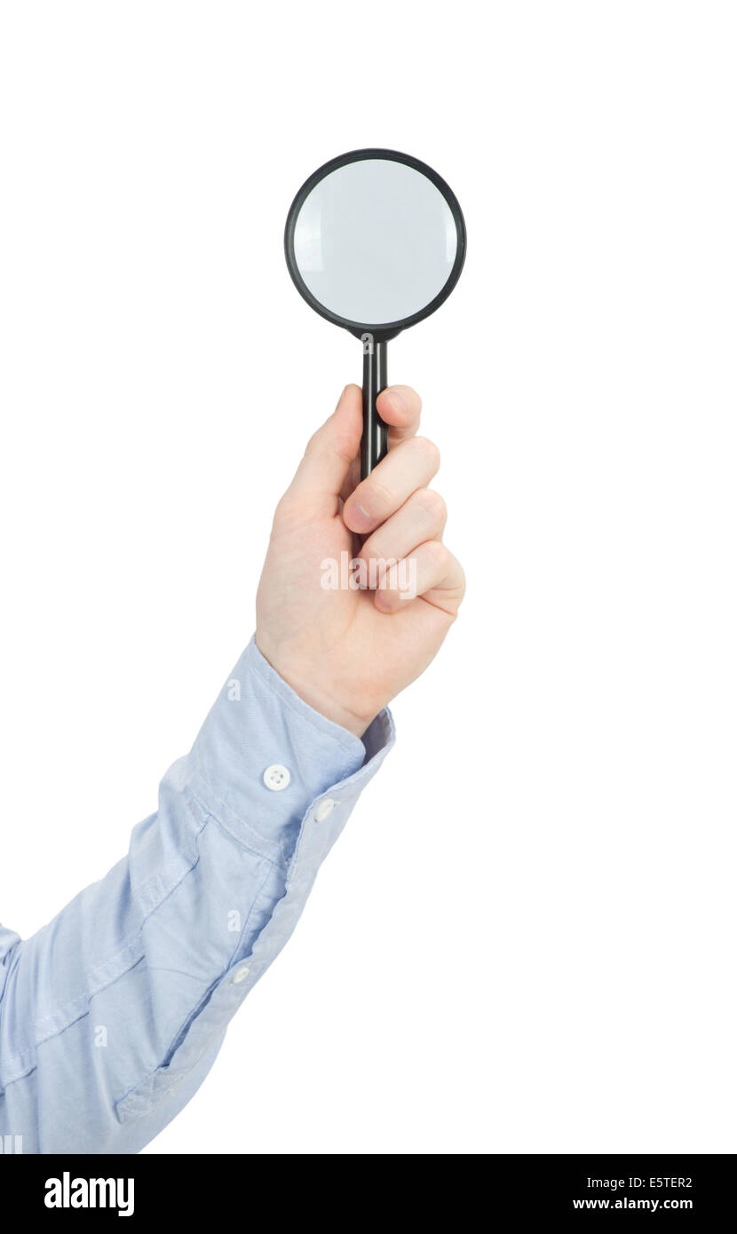 Man's hand holding magnifying glass Stock Photo - Alamy