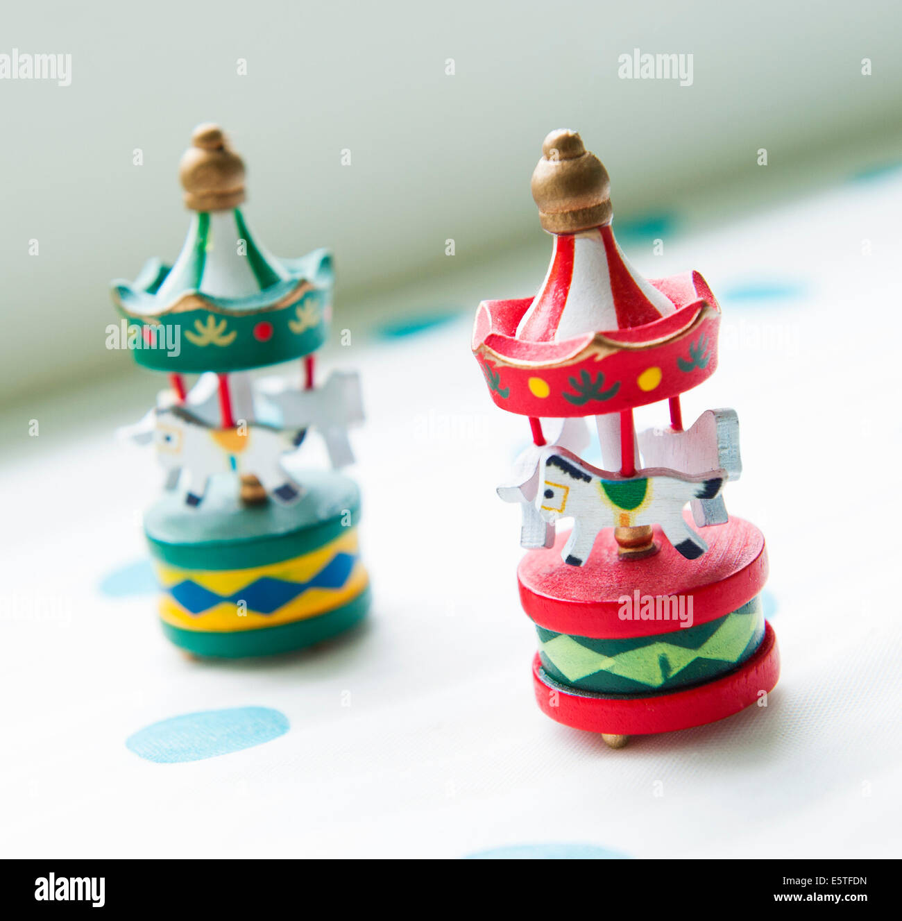 Wooden toy carousel Stock Photo - Alamy