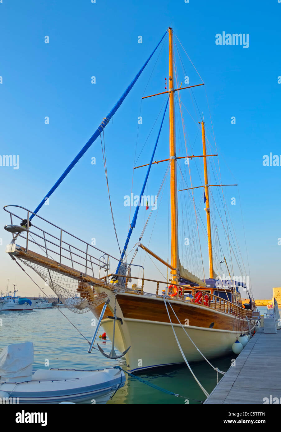 two-masted sailing ship anchored in the harbor of Trani, Apulia - Italy ...