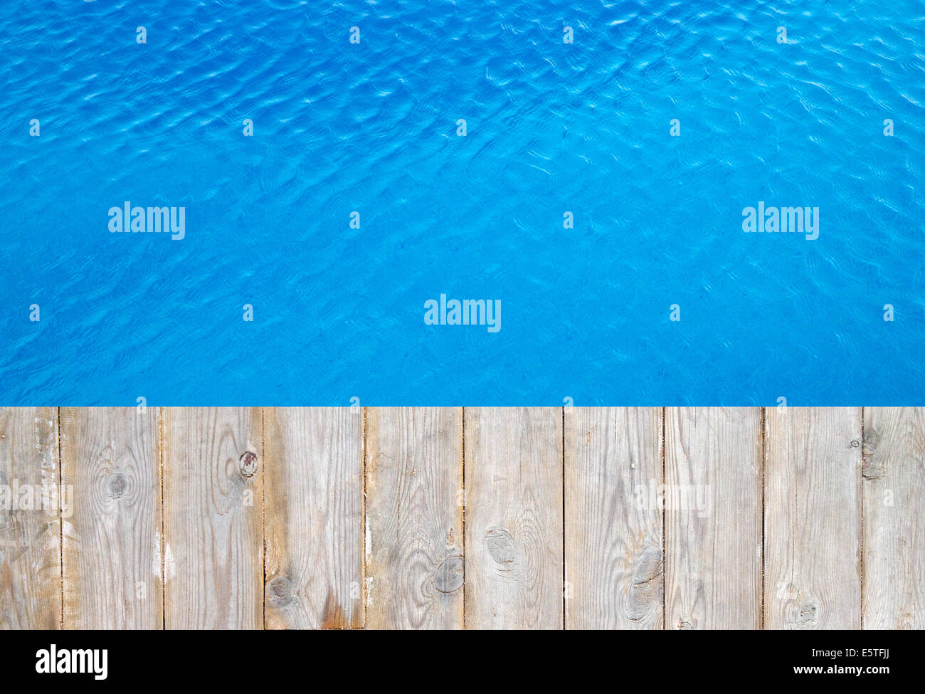 Blue water with sun reflections Stock Photo - Alamy