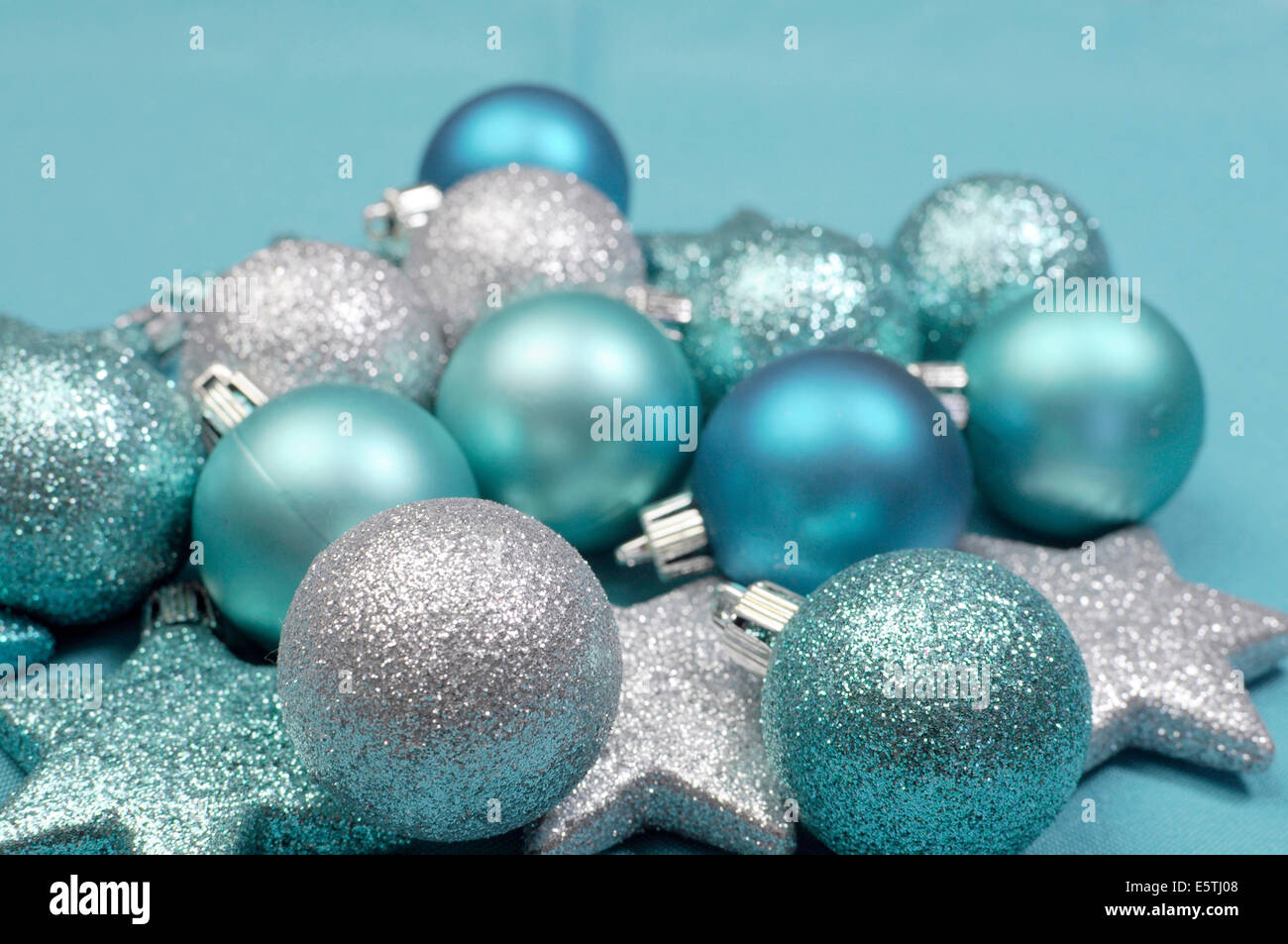 Festive background of aqua turquoise pale blue Christmas glitter ...