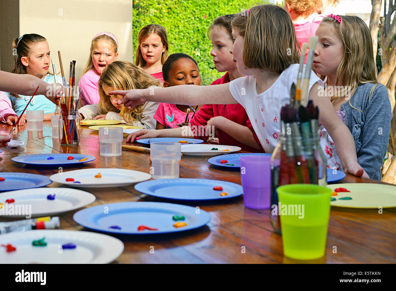 Girls painting at party together Stock Photo - Alamy
