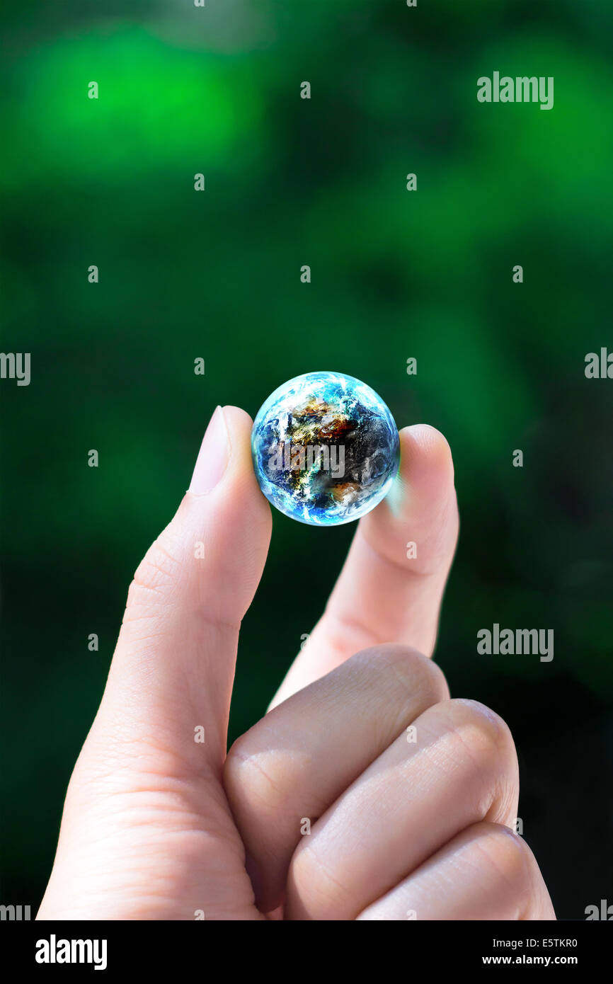 hand hold small world Stock Photo - Alamy