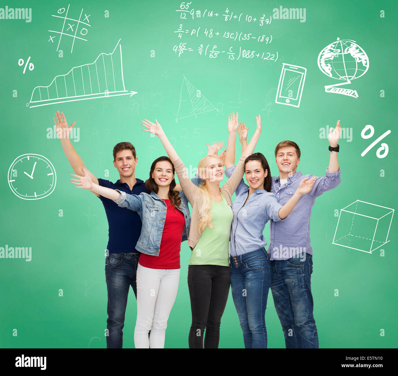 group of smiling students over green board Stock Photo - Alamy
