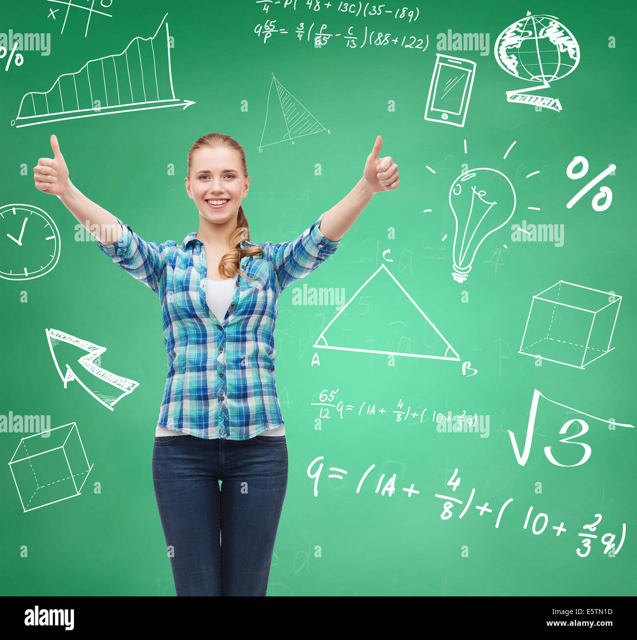 smiling student girl showing thumbs up Stock Photo - Alamy