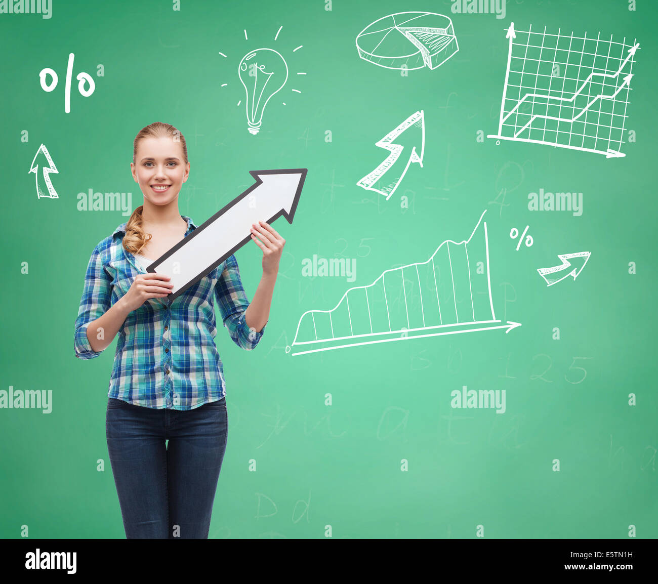 smiling student girl with white arrow pointing up Stock Photo - Alamy