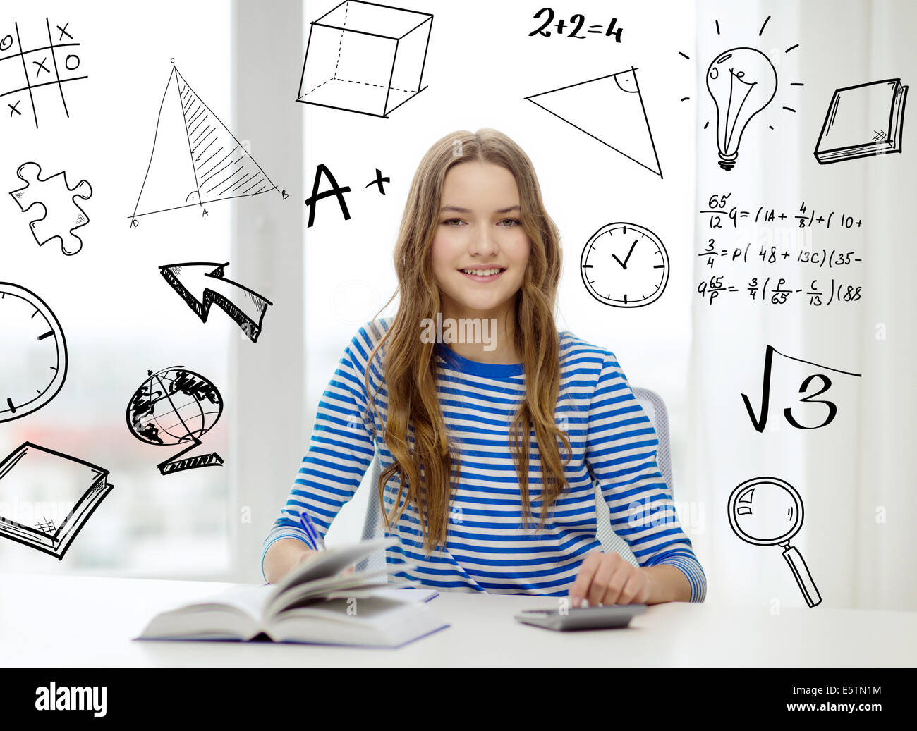 student girl with book, notebook and calculator Stock Photo - Alamy