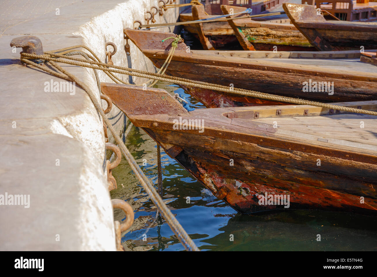 Traditional Abra boat at the pier in Dubai Stock Photo - Alamy