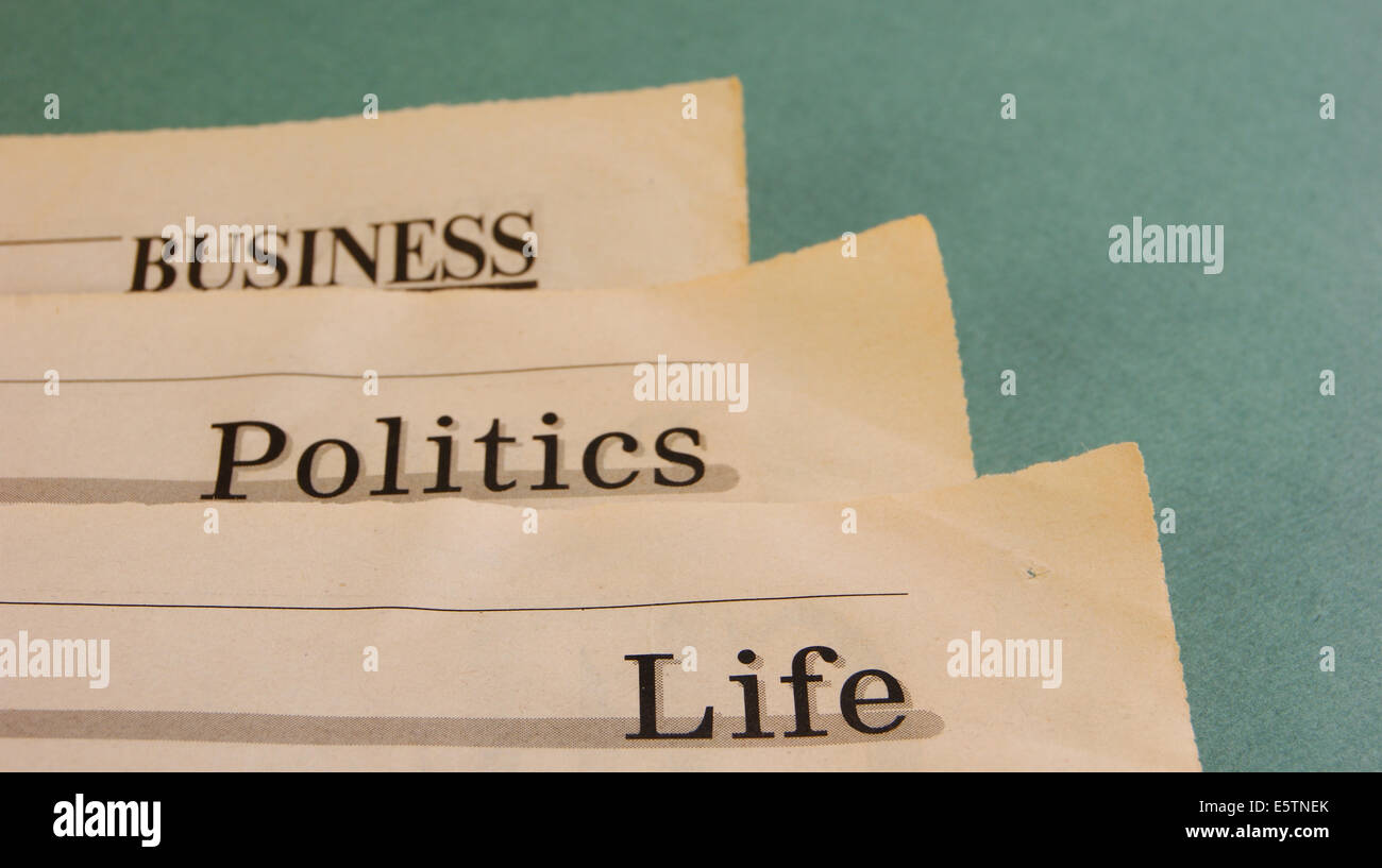 old newspaper on a green background Stock Photo - Alamy