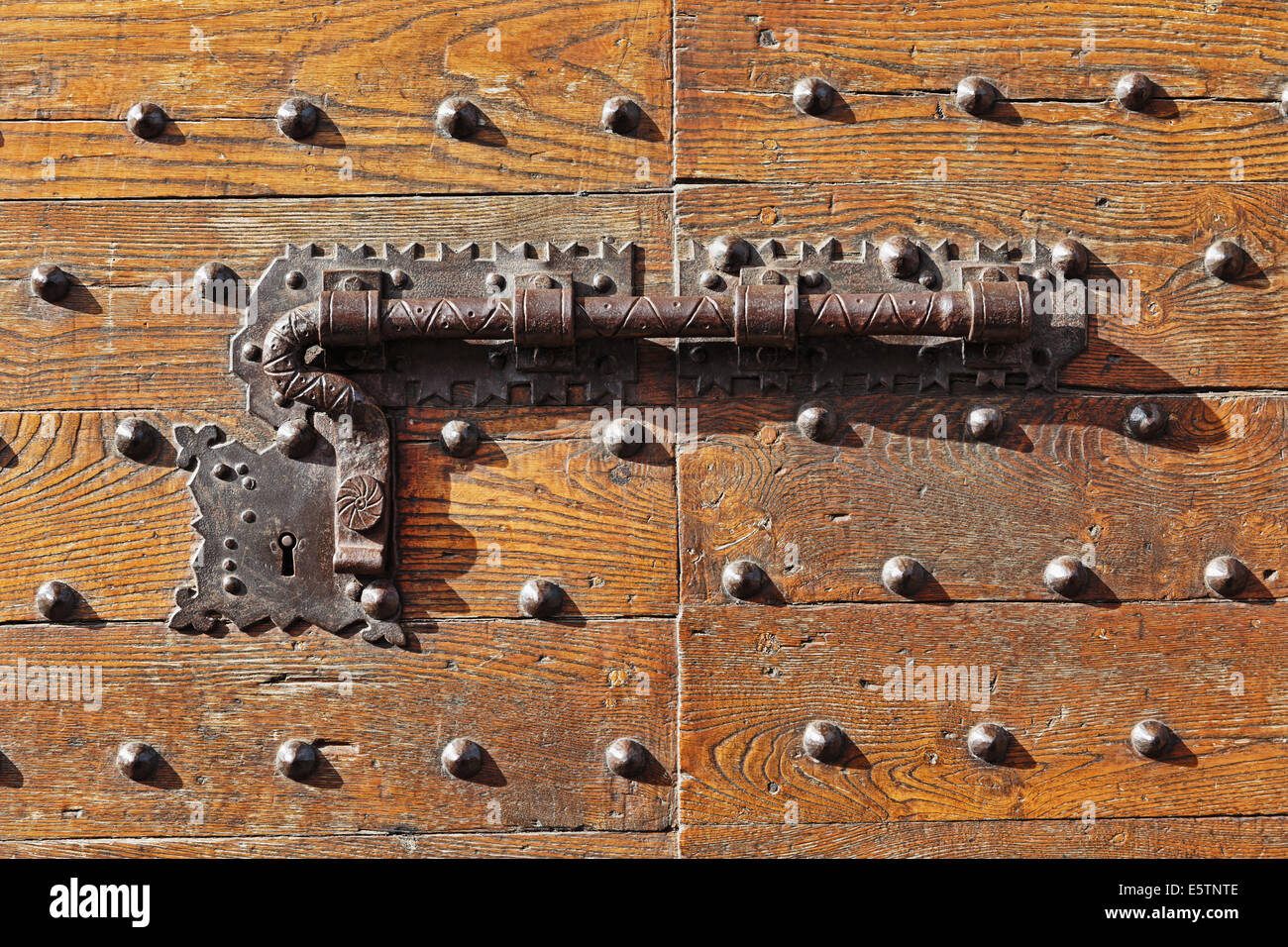 Old door lock on a wooden door Stock Photo - Alamy