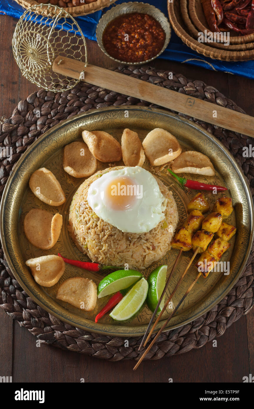 Nasi goreng. Indonesian fried rice with satay Stock Photo - Alamy