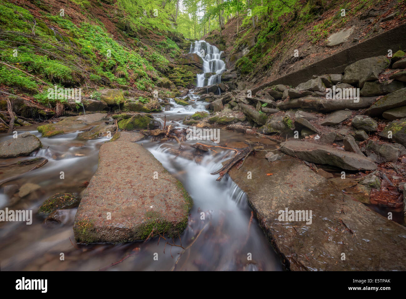 waterfall on mountain in summer time Stock Photo - Alamy