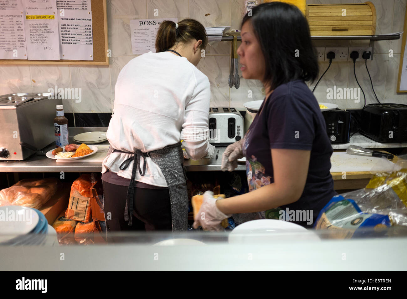 Workers Staff in Greasy Spoon Cafe making Breakfast Stock Photo - Alamy