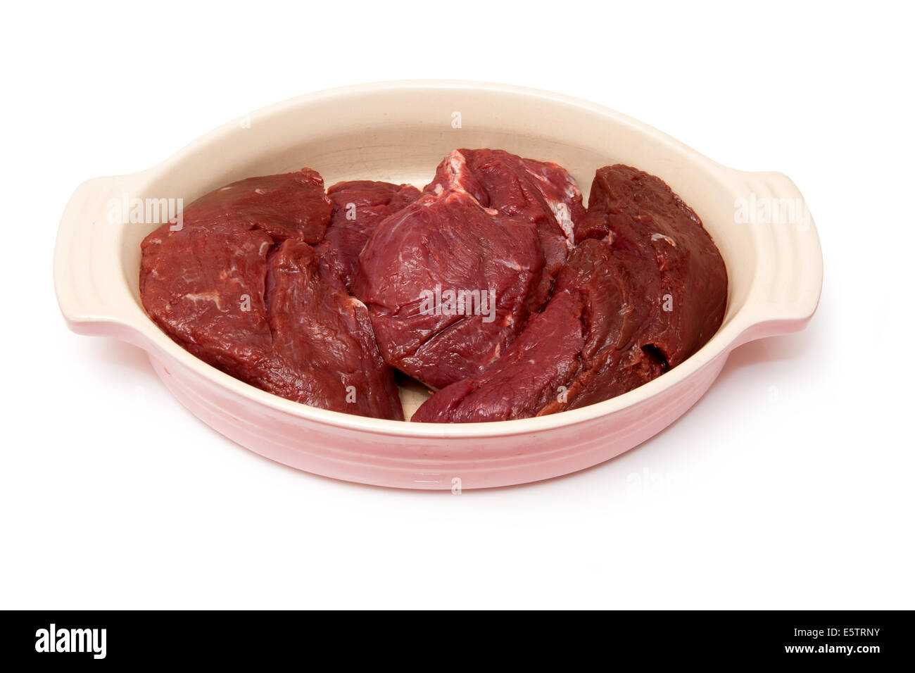 Dish of Kangaroo meat steaks isolated on a white studio background ...