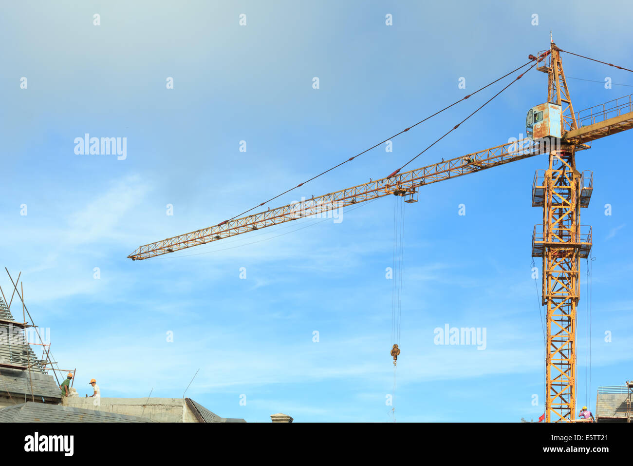 Tower cranes lifting beam hi-res stock photography and images - Alamy
