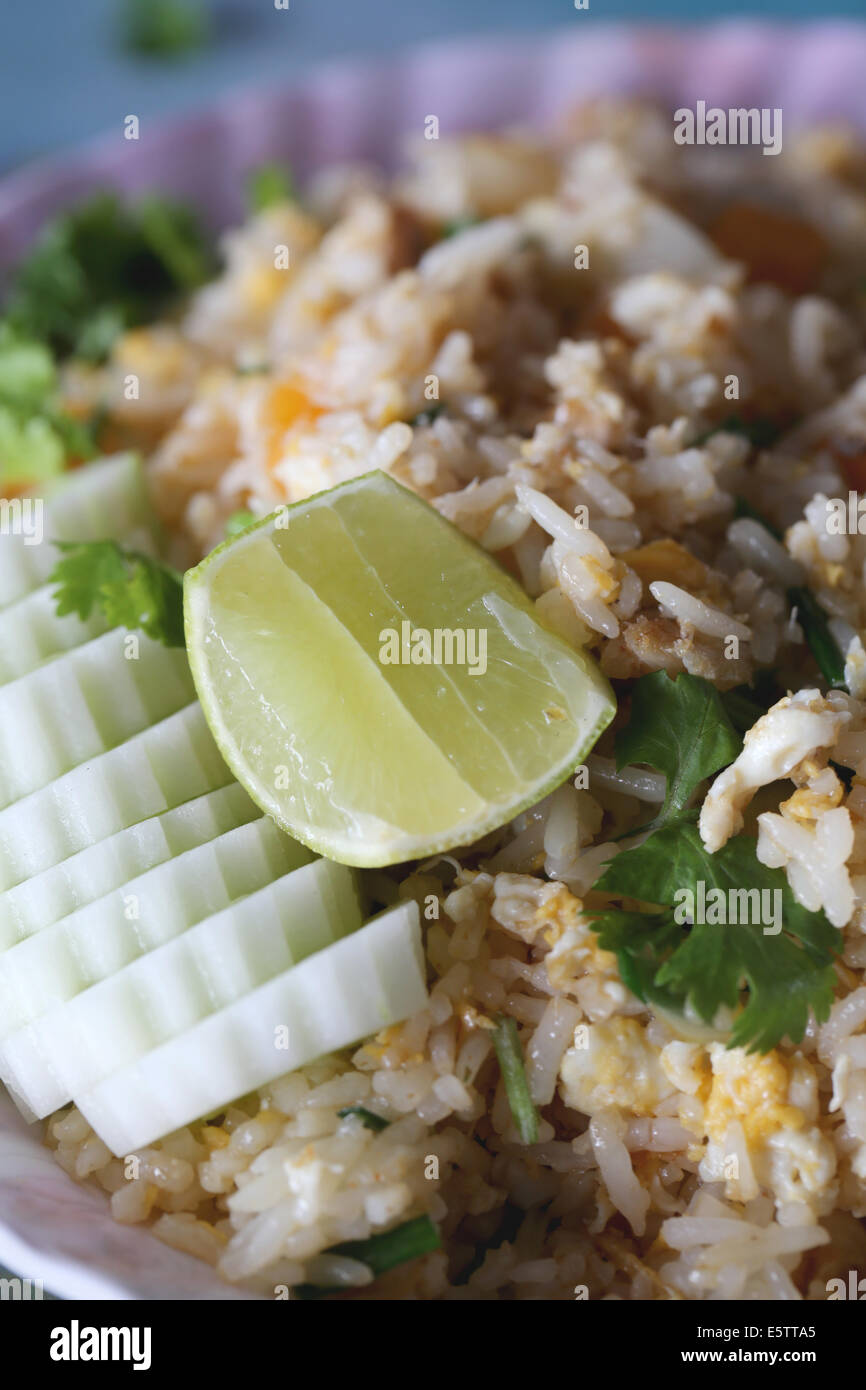 Lemon on fried rice with crab for food background Stock Photo - Alamy