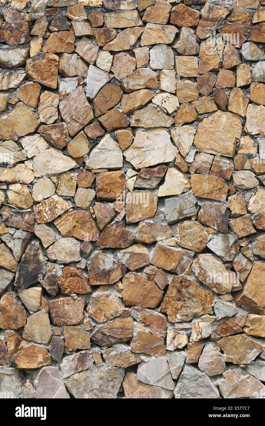 Brown stone wall for background Stock Photo - Alamy