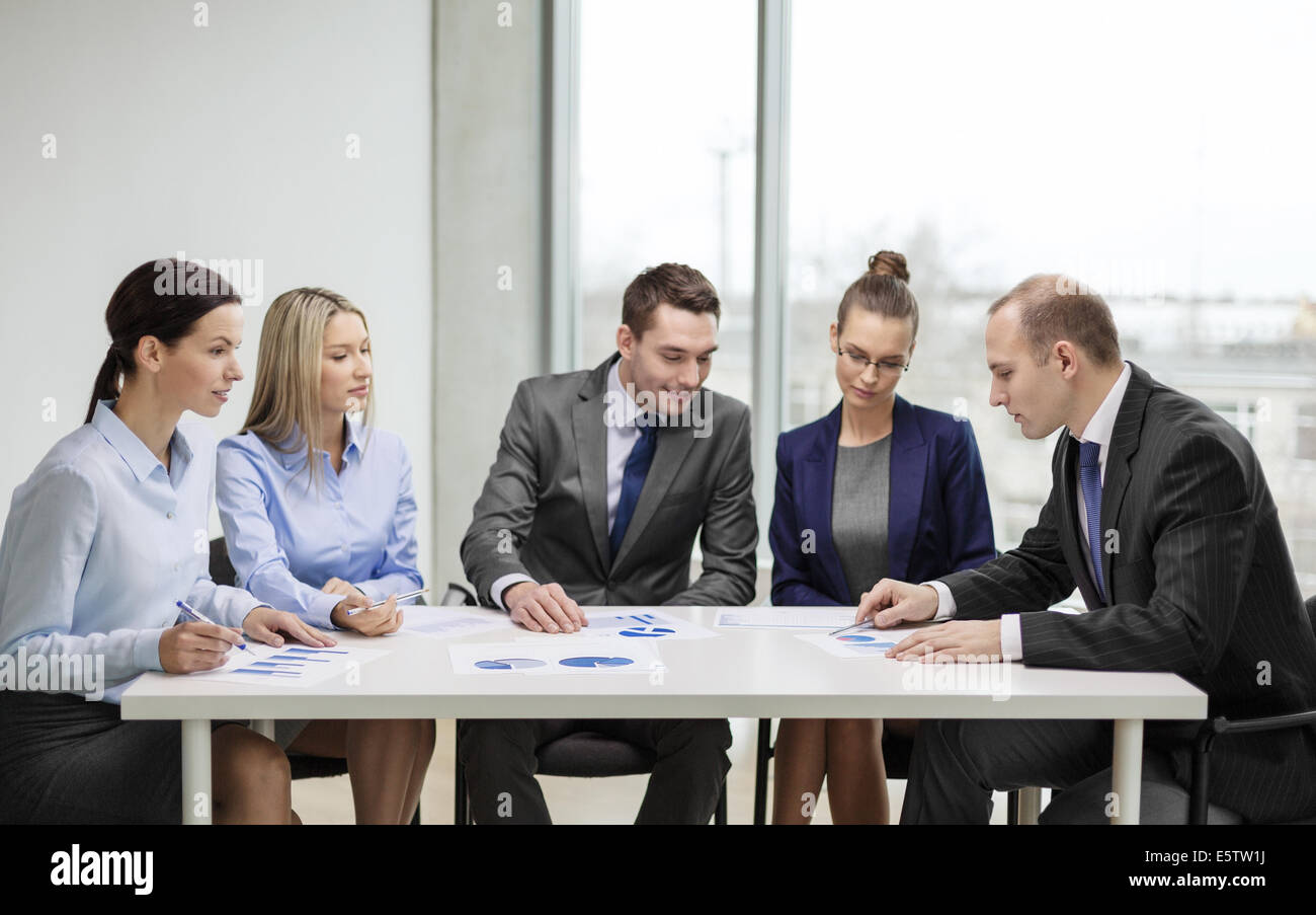 business team with documents having discussion Stock Photo - Alamy