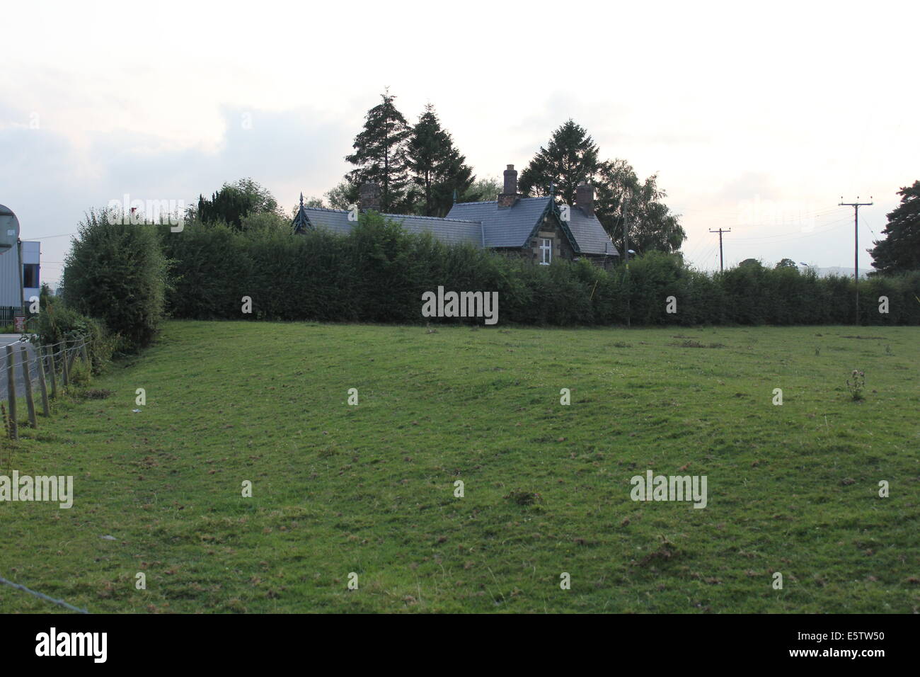Caersws featuring the remains of the roman fort rampart with the ...