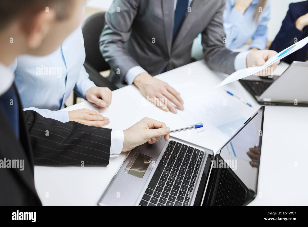 close up of files and laptop computer in office Stock Photo - Alamy