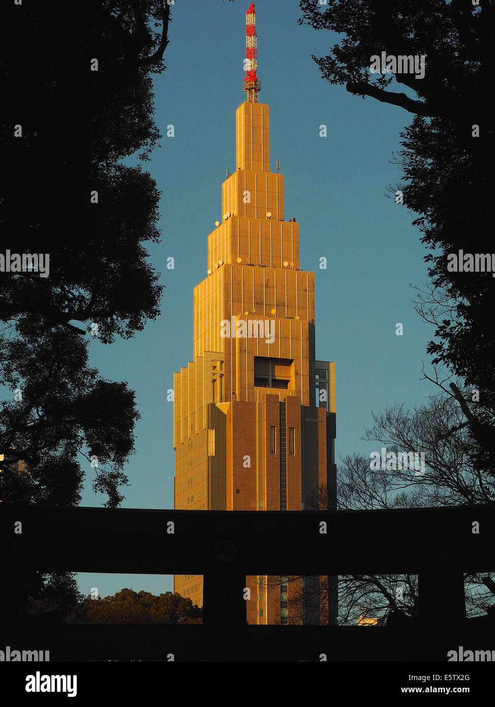 NTT Docomo Building with Meiji Shrine Torii Gate, Tokyo, Japan Stock ...