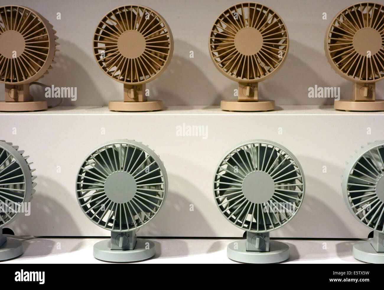 Desktop cooling fans in London store window Stock Photo - Alamy