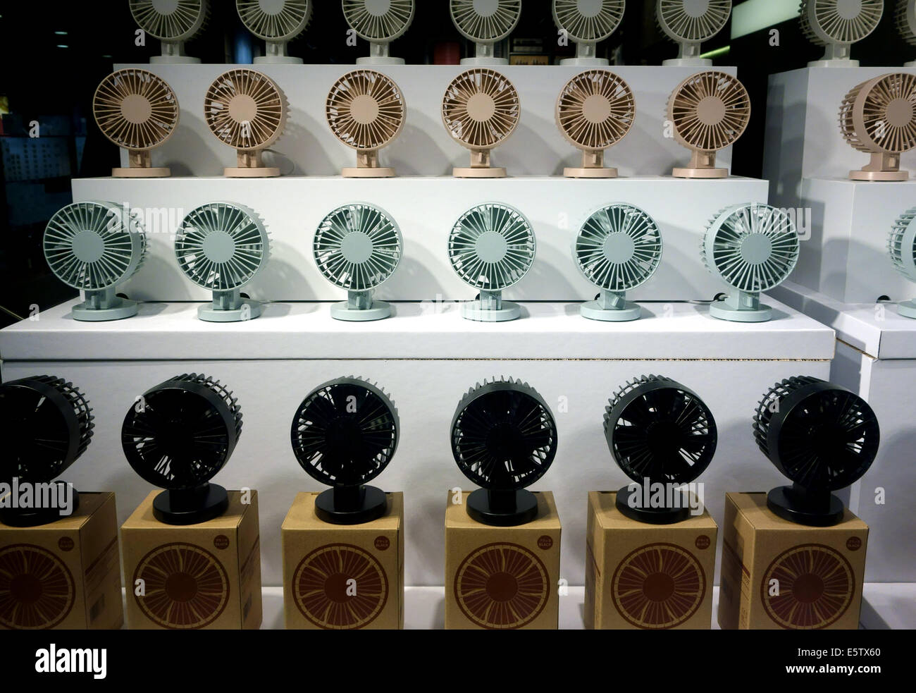 Desktop cooling fans in London store window Stock Photo - Alamy