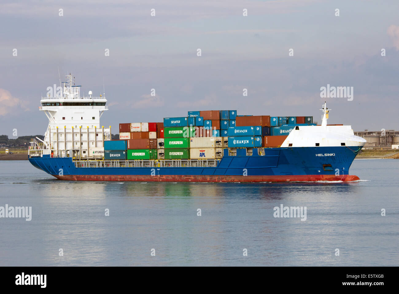 Container ship leaving the Port of Rotterdam Stock Photo - Alamy