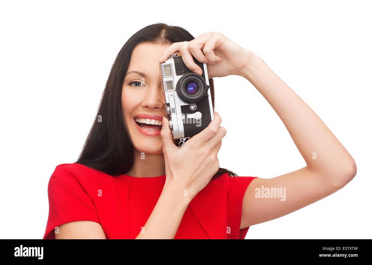 smiling woman taking picture with digital camera Stock Photo - Alamy
