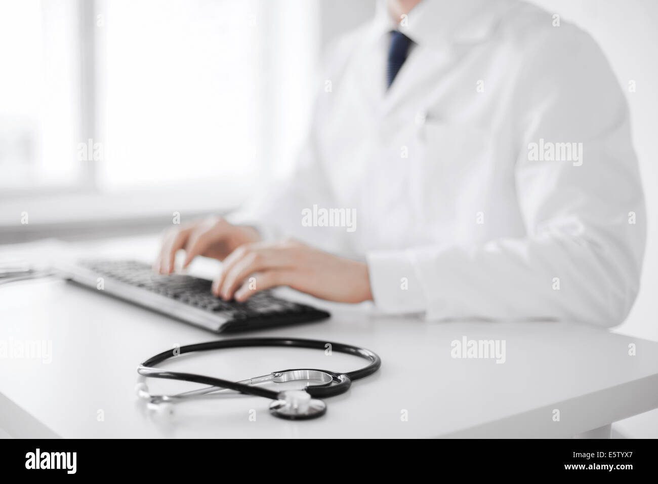 Doctor writing medical notes typing hi-res stock photography and images ...
