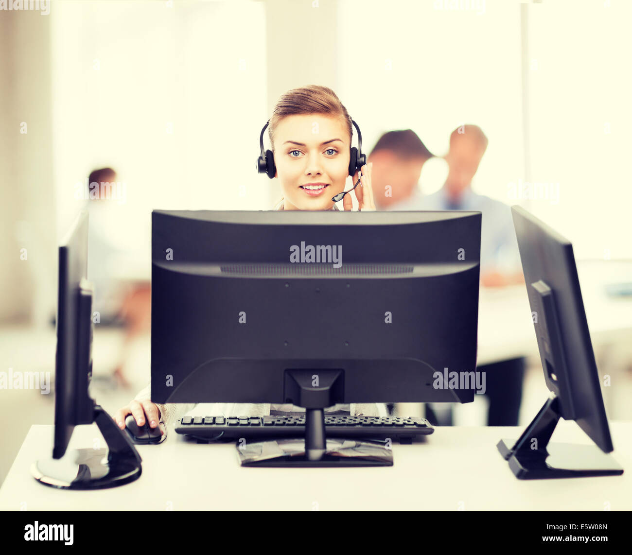friendly female helpline operator Stock Photo - Alamy