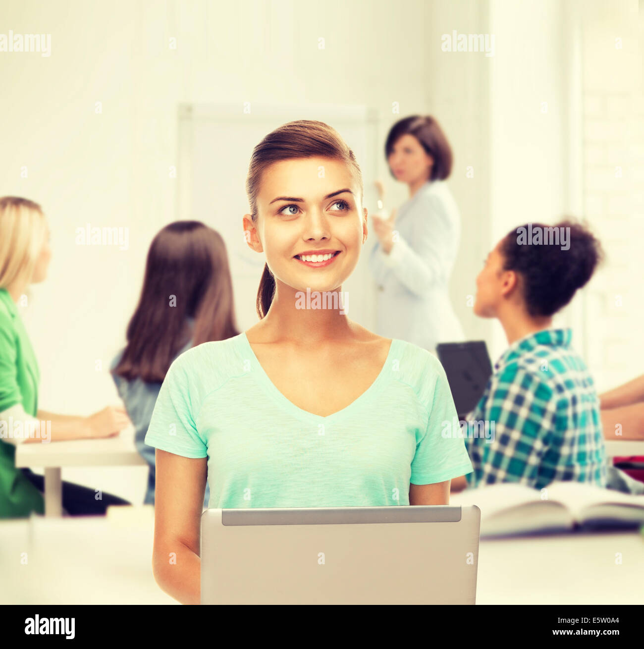 student with laptop at school Stock Photo - Alamy