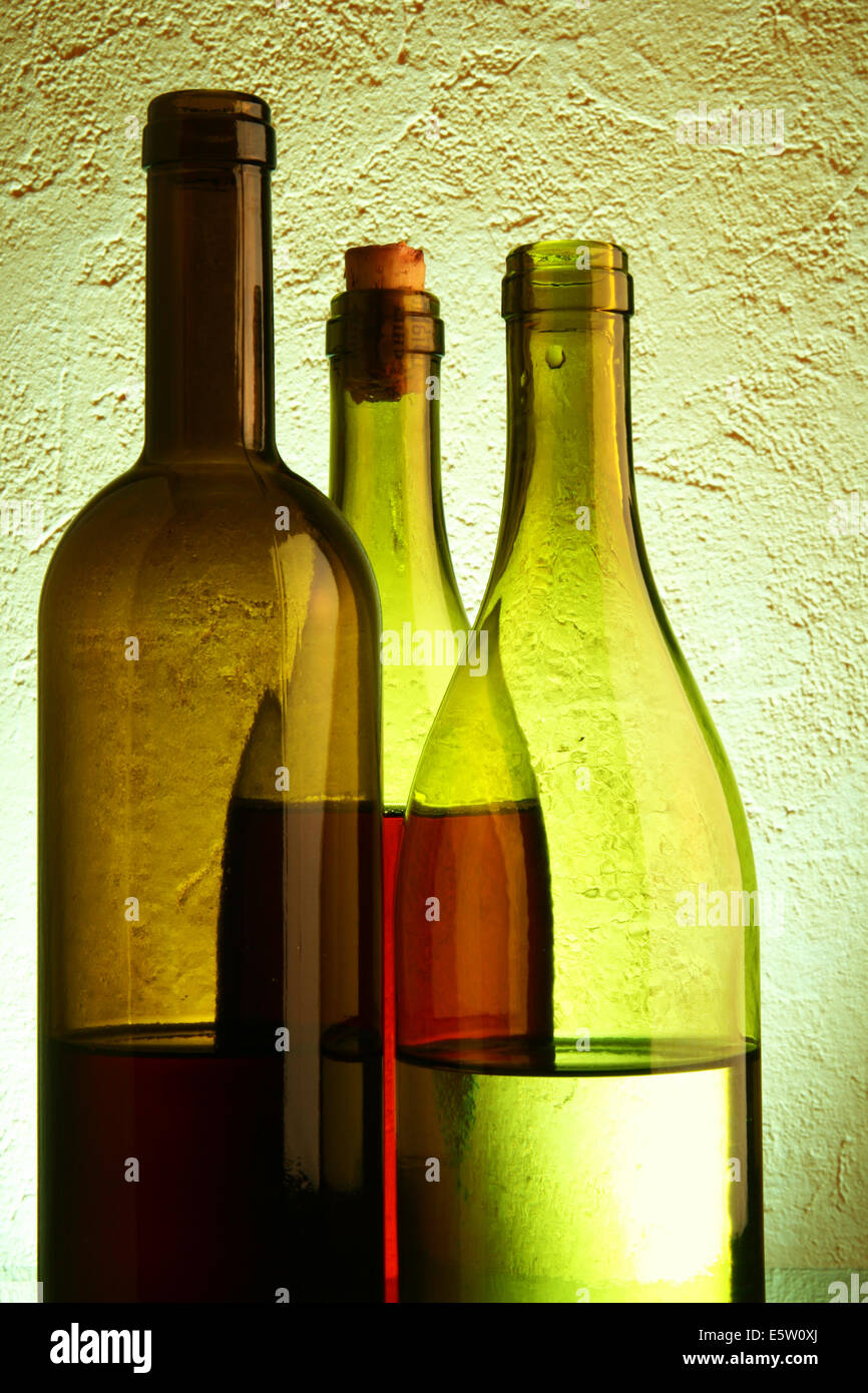 Still-life with three wine bottles Stock Photo - Alamy