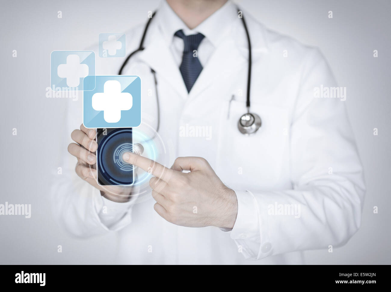 doctor holding smartphone with medical app Stock Photo - Alamy