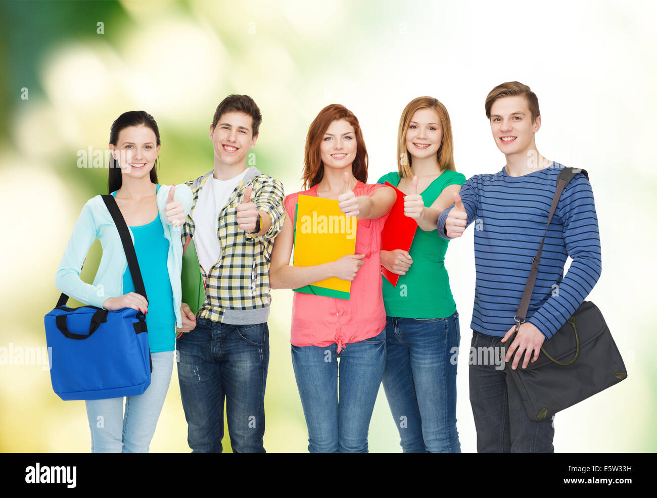 group of smiling students standing Stock Photo - Alamy
