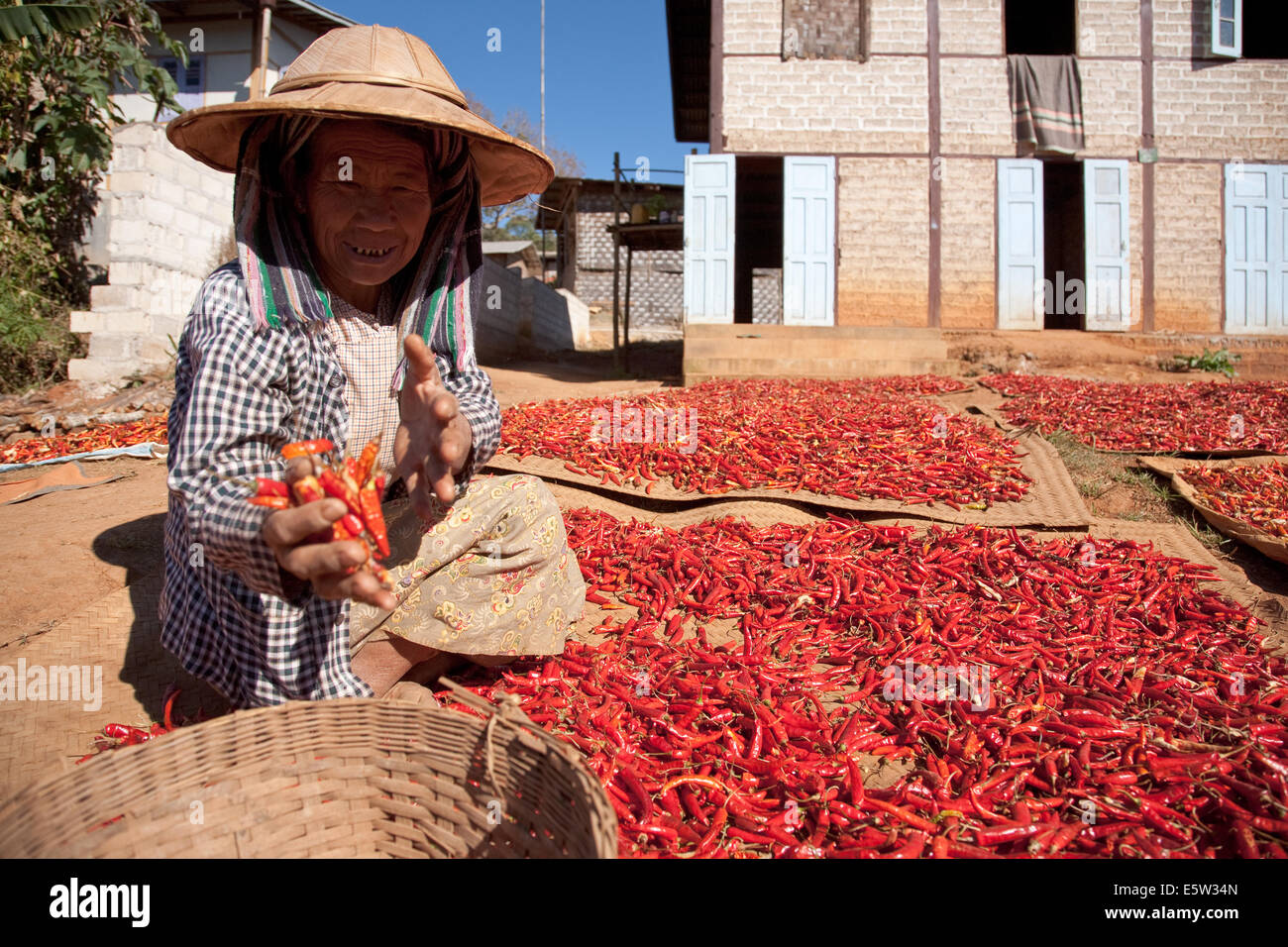Drying chilli peppers in a village hi-res stock photography and images ...