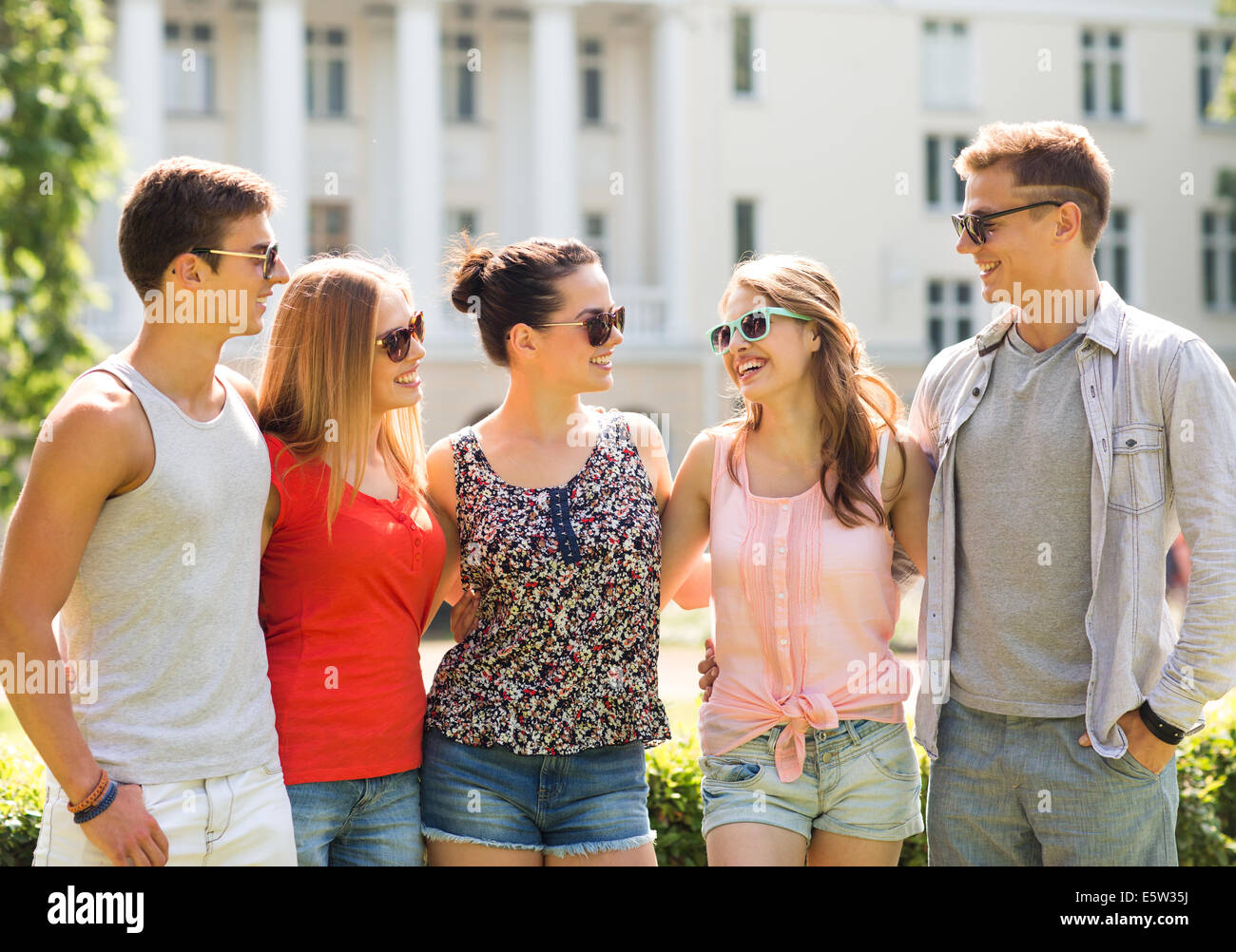 group of smiling friends outdoors Stock Photo - Alamy