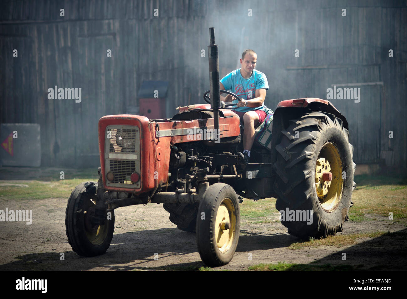 Man tractor hi-res stock photography and images - Alamy