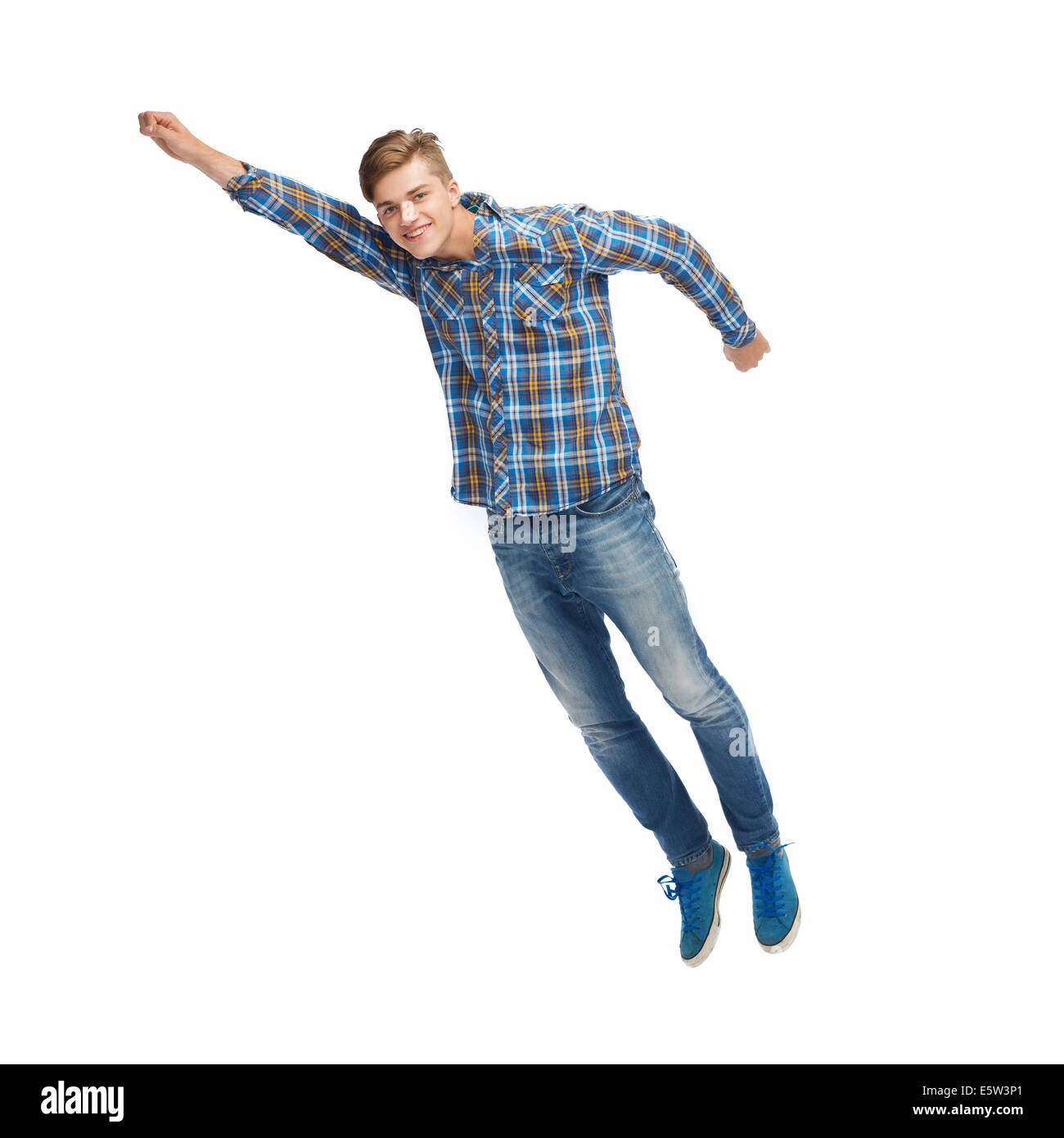 smiling young man flying in air Stock Photo - Alamy