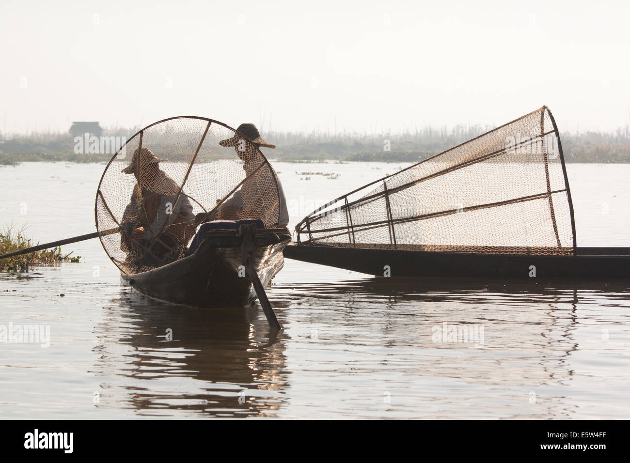 Fishermen using traditional conical shaped fish traps, Inle lake, Shan ...