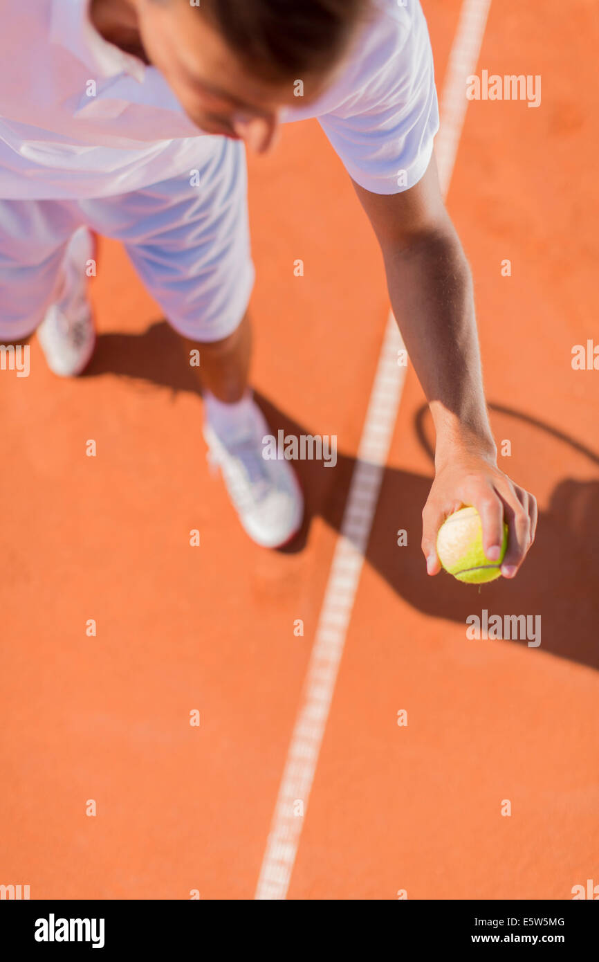Young man playing tennis Stock Photo - Alamy