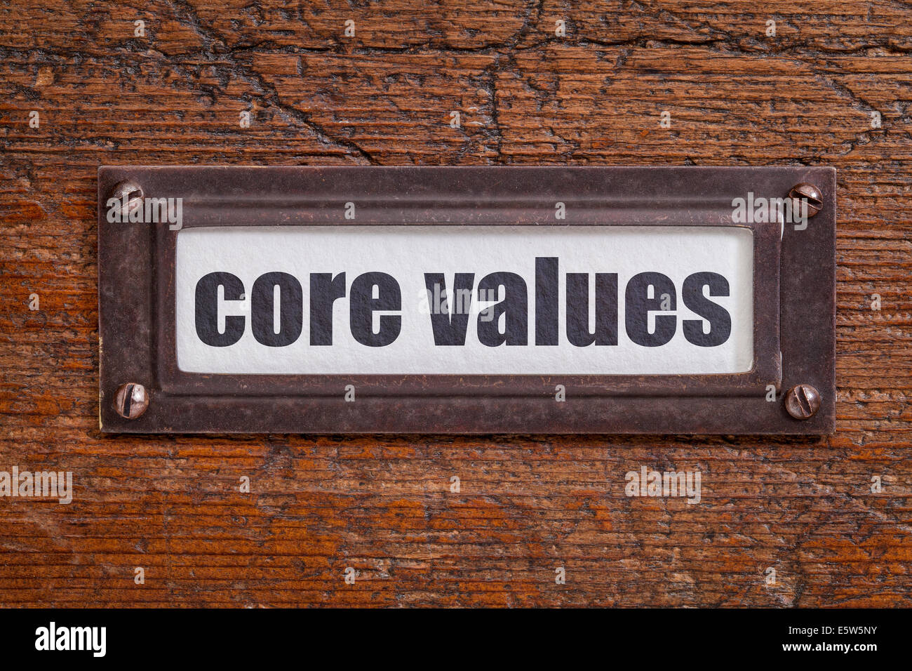 core values tag - file cabinet label, bronze holder against grunge and ...