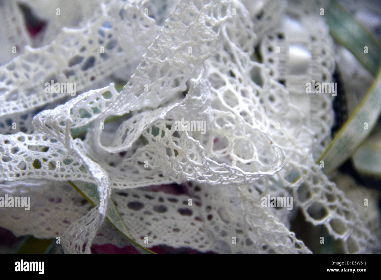 heap lace with ribbon as background Stock Photo - Alamy