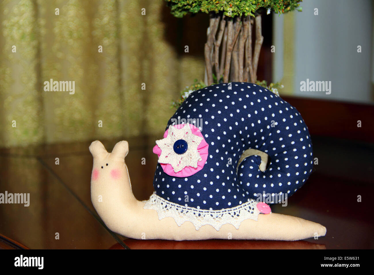 big beautiful tilda textile snail Stock Photo - Alamy