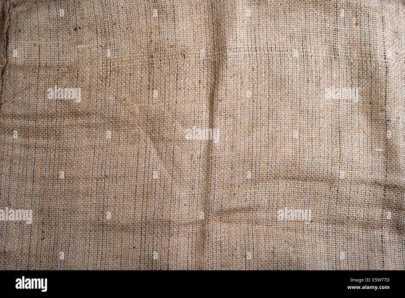Old burlap coffee bag background Stock Photo - Alamy