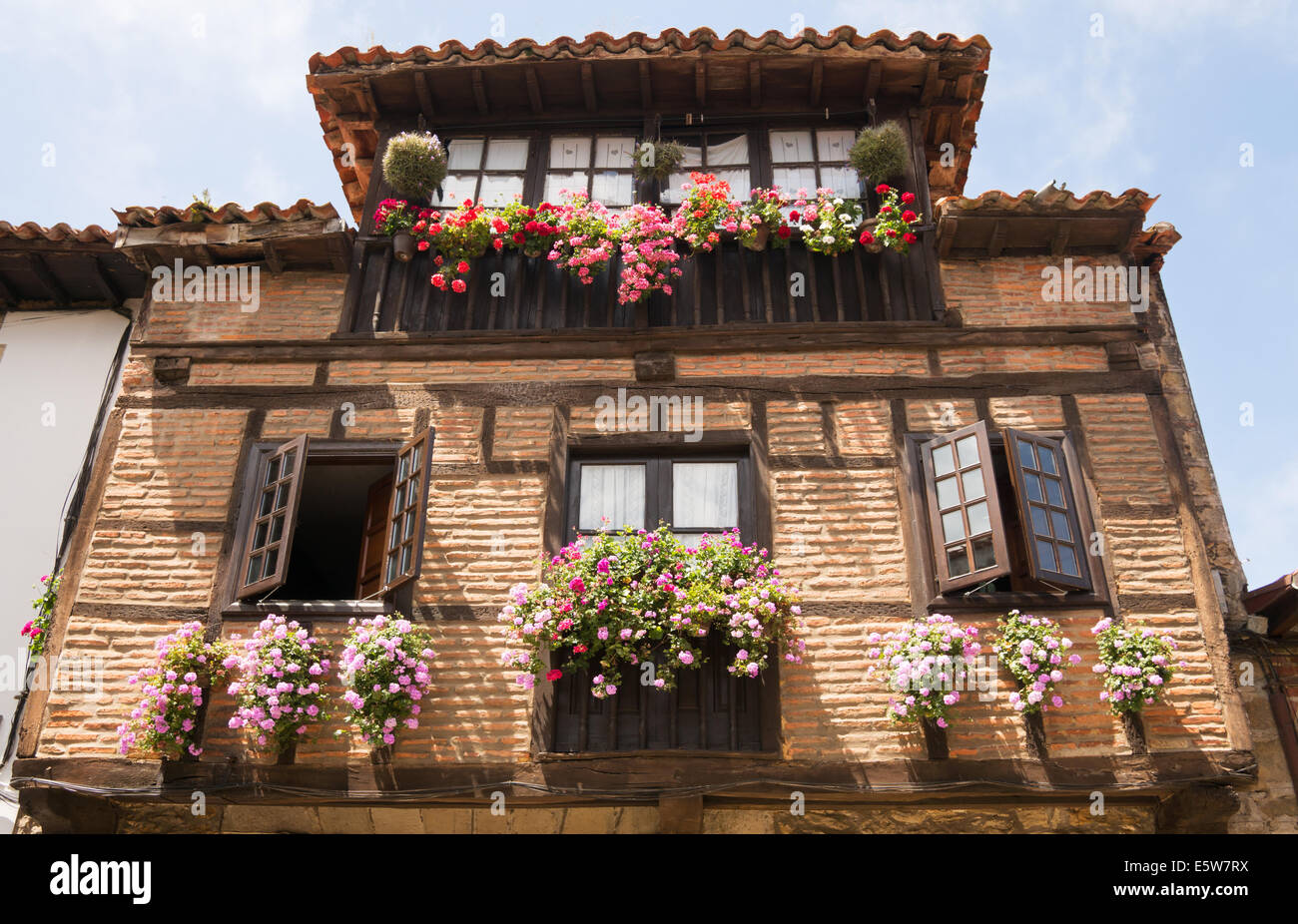 Window boxes with flowers Santillana del Mar, Cantabria, Northern Spain ...