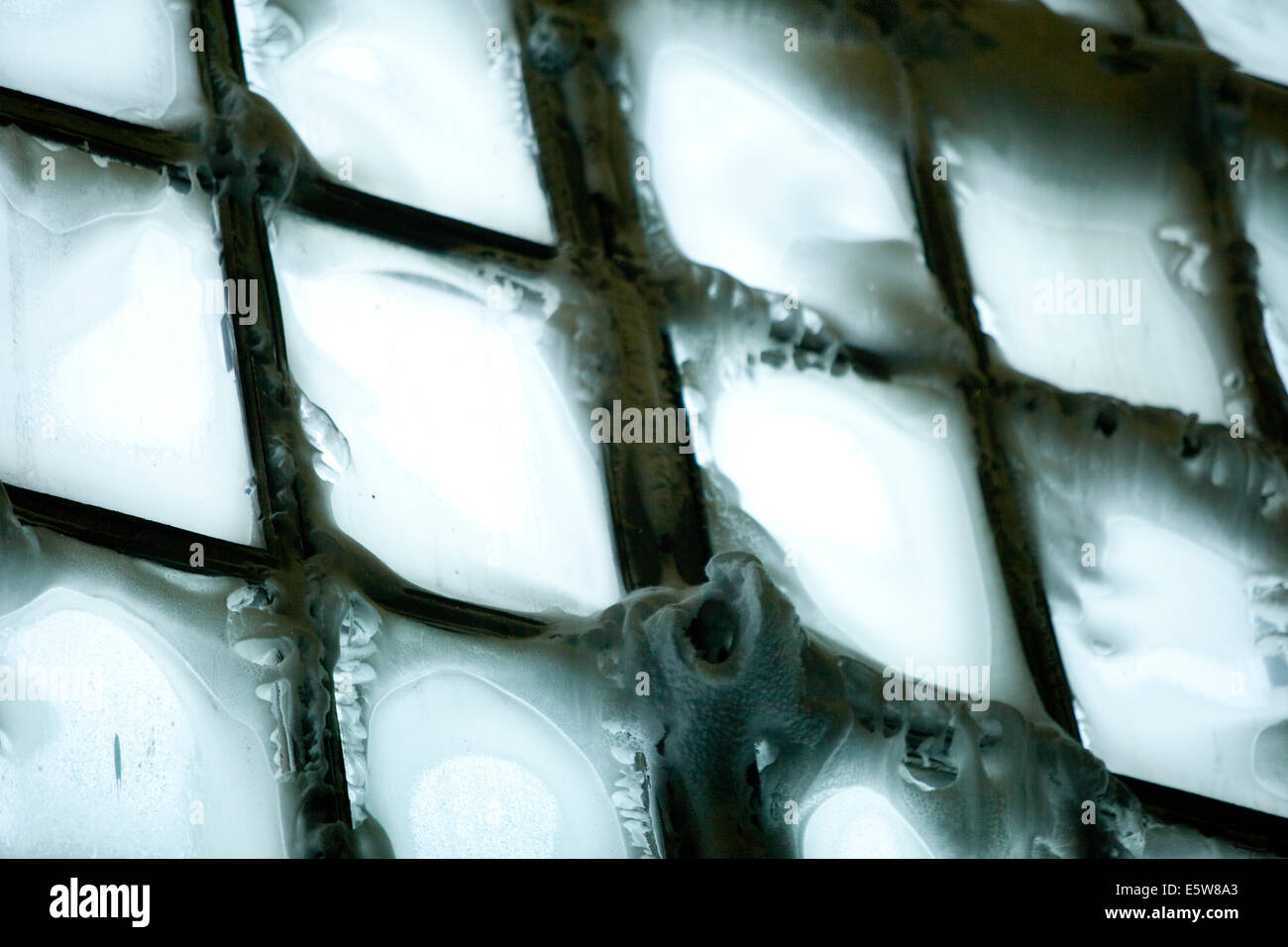 Frozen window panes ice solid Stock Photo - Alamy