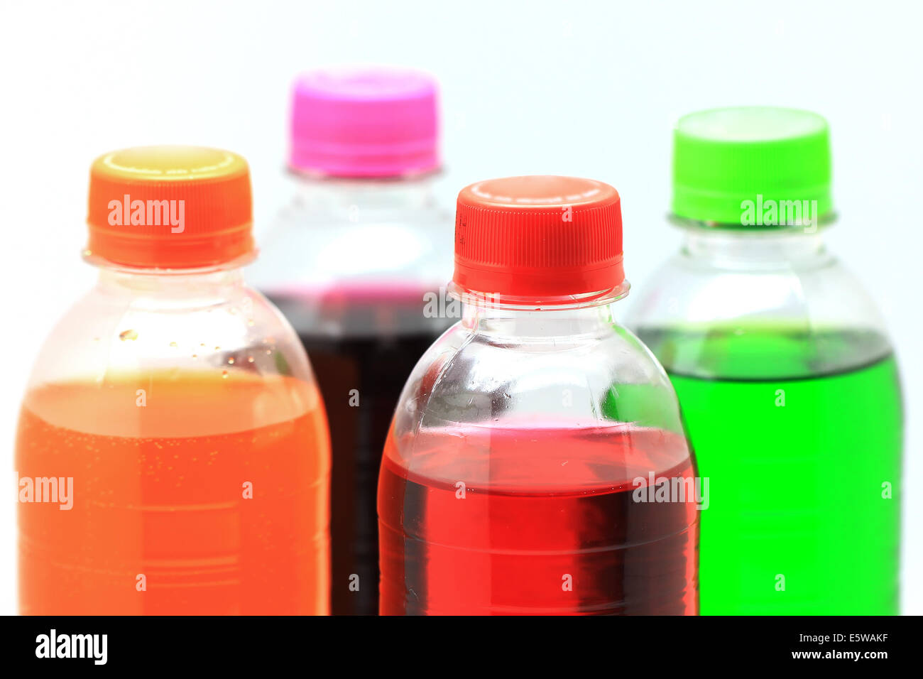 colorful of soft drink bottles isolated on white background Stock Photo ...