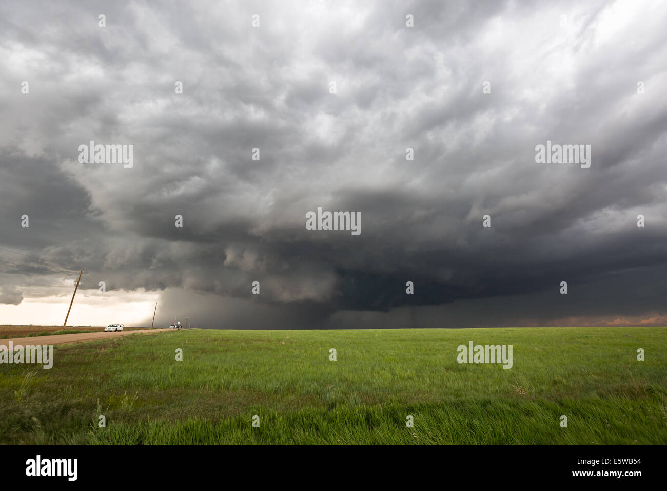 A tornado warned supercell thunderstorm rolls across the plains of ...